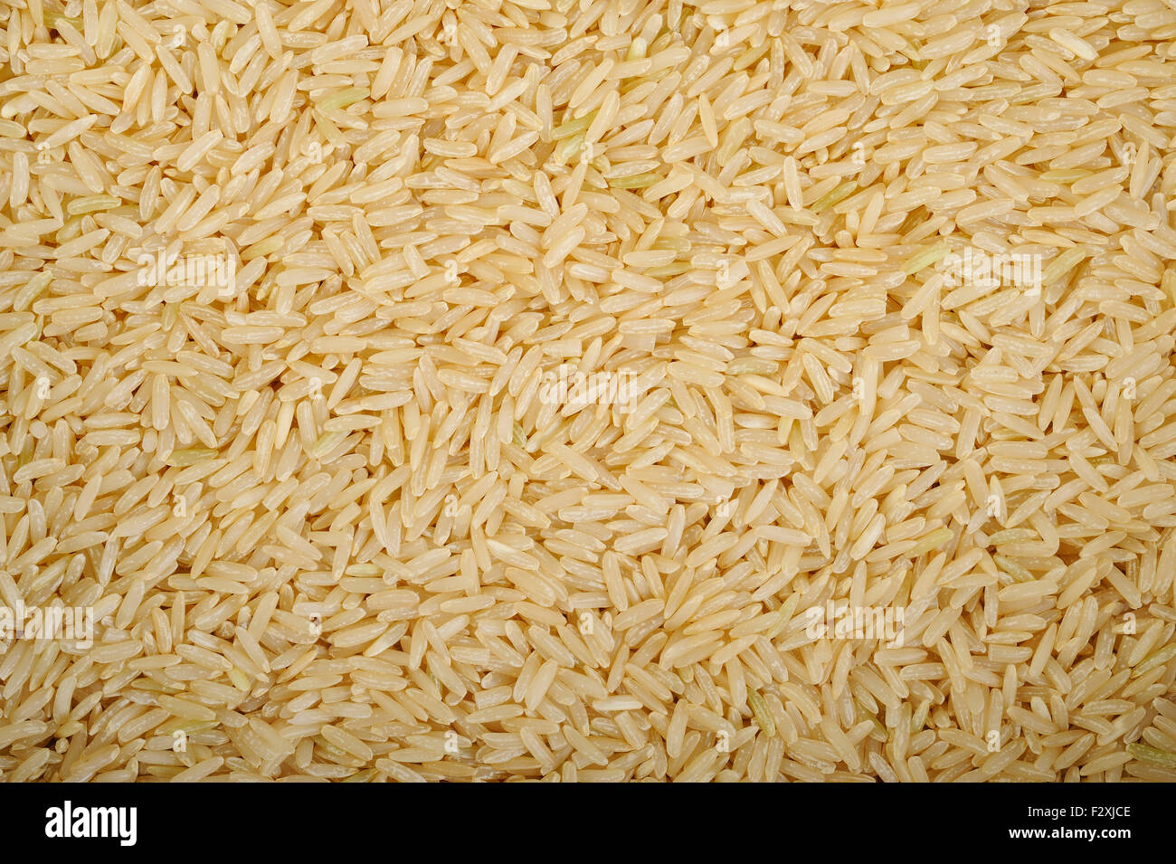 Brown rice background Stock Photo - Alamy