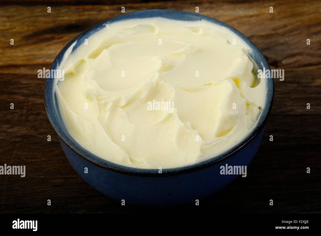 sour cream cheese in bowl Stock Photo - Alamy