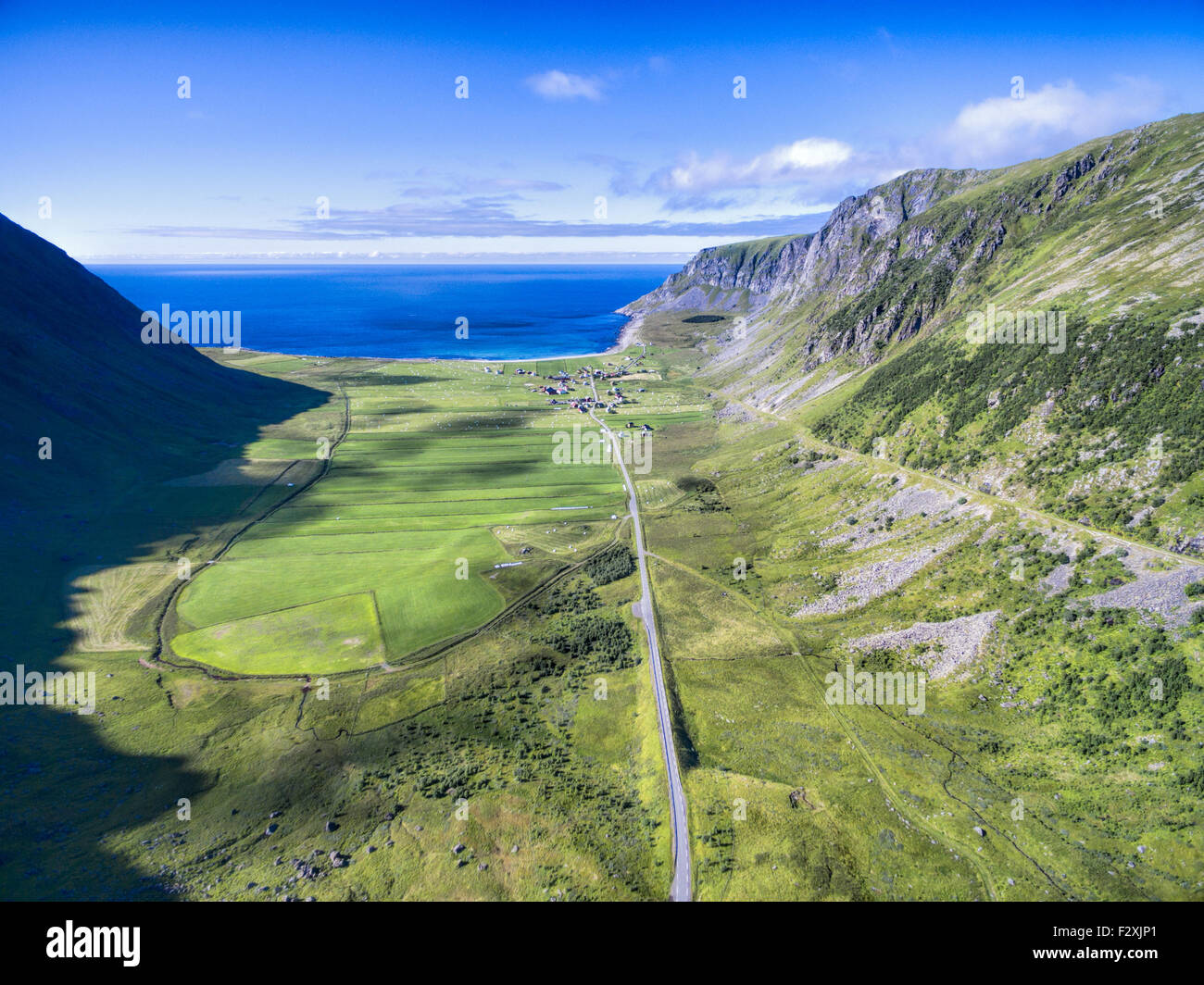 Village Unstad on Lofoten islands and road leading to it Stock Photo ...