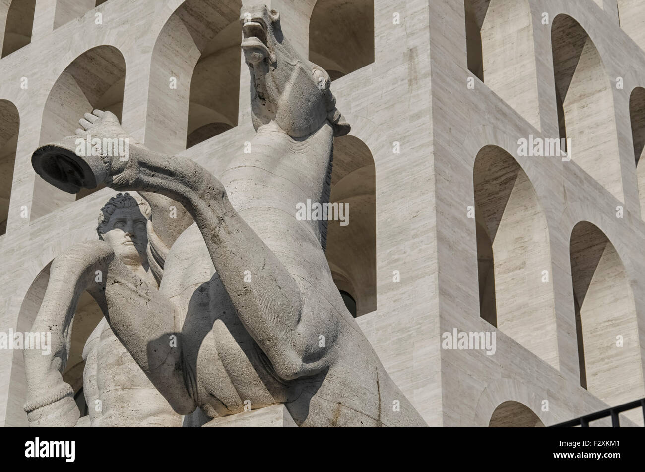 Sculpture of horse in front of a symbol of Rome Stock Photo - Alamy