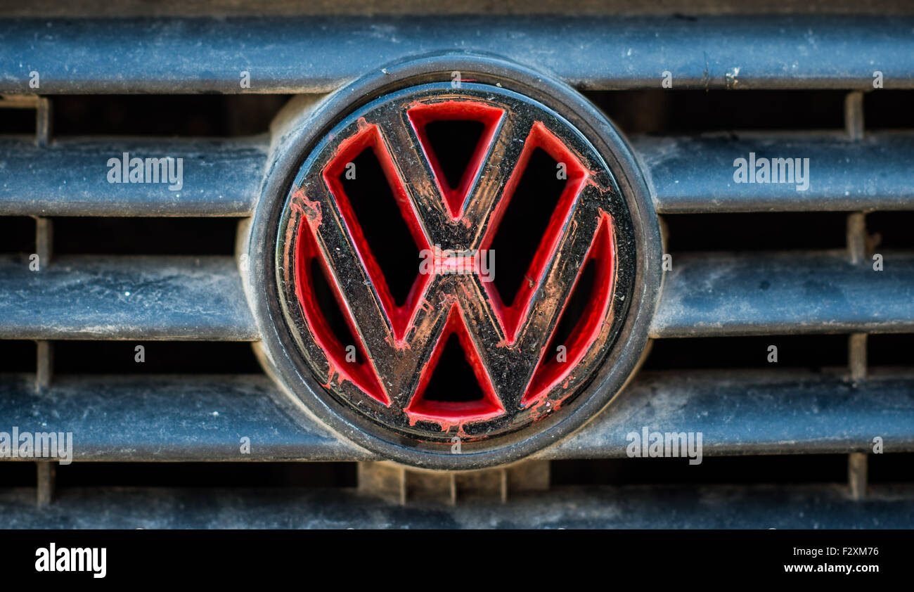 The corporate logo of Volkswagen on a Volkswagen Golf in front of the ...