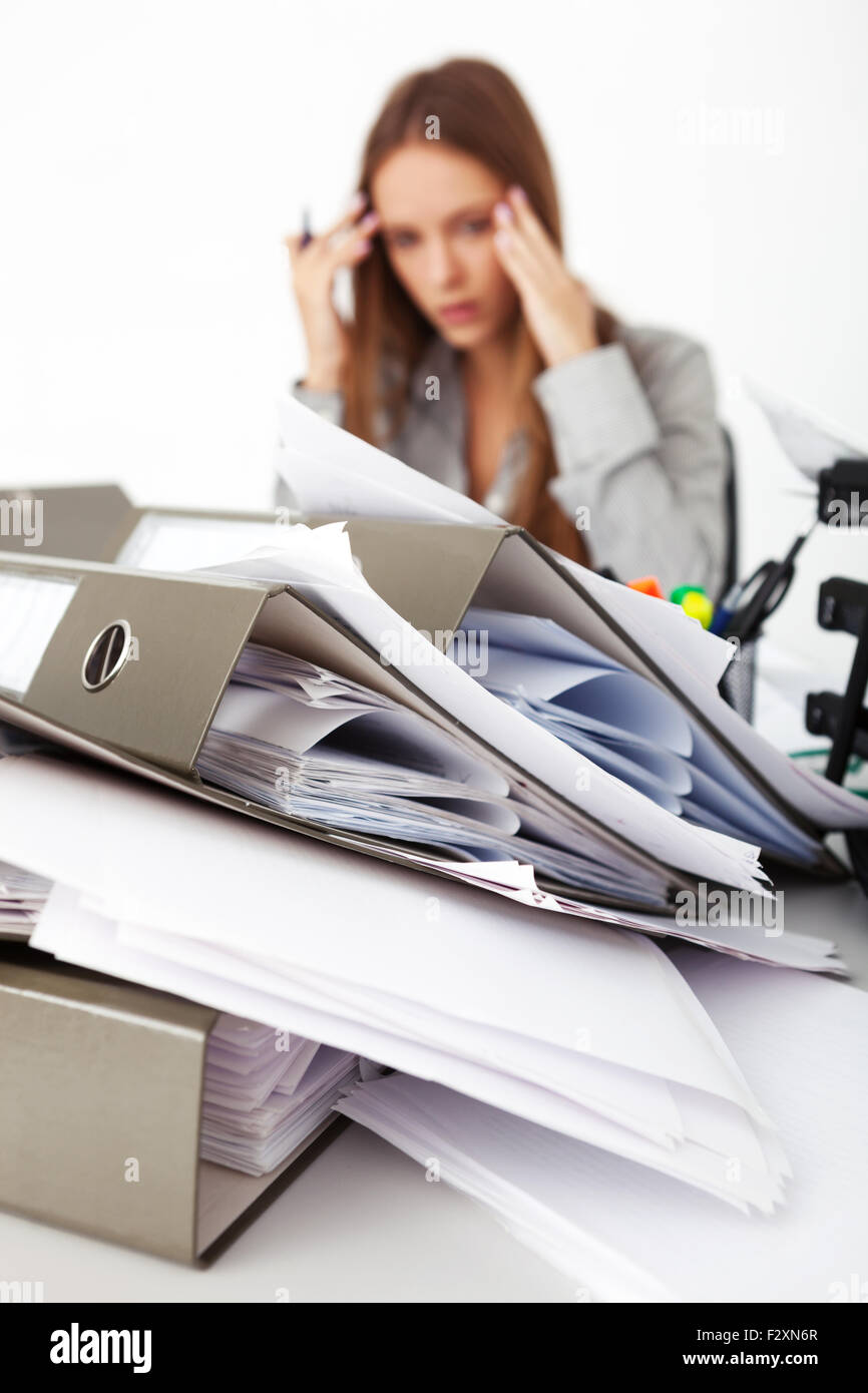 Woman surrounded by paperwork hi-res stock photography and images - Alamy