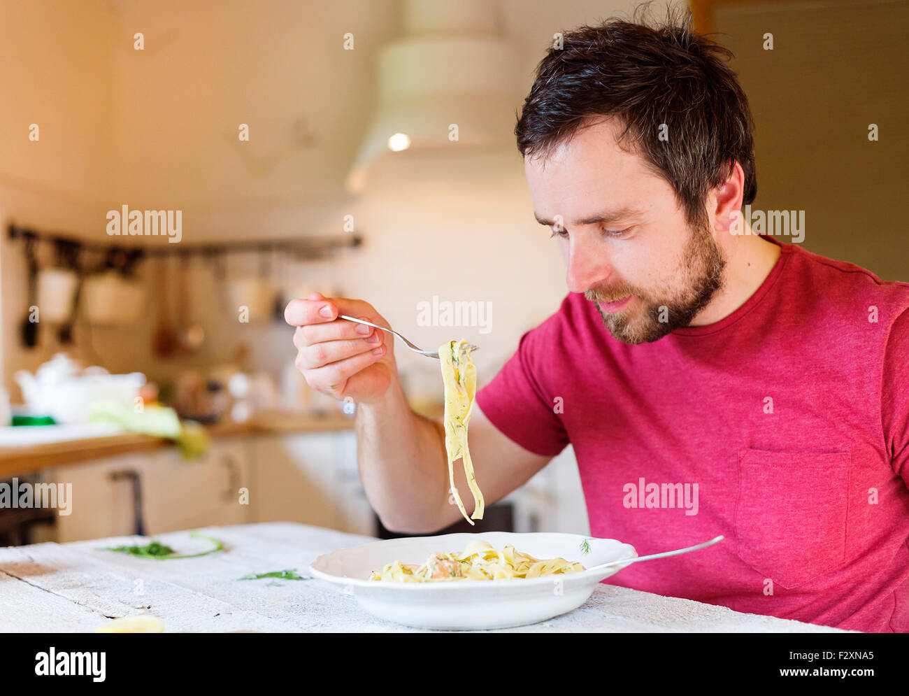 Man eating fish hi-res stock photography and images - Alamy