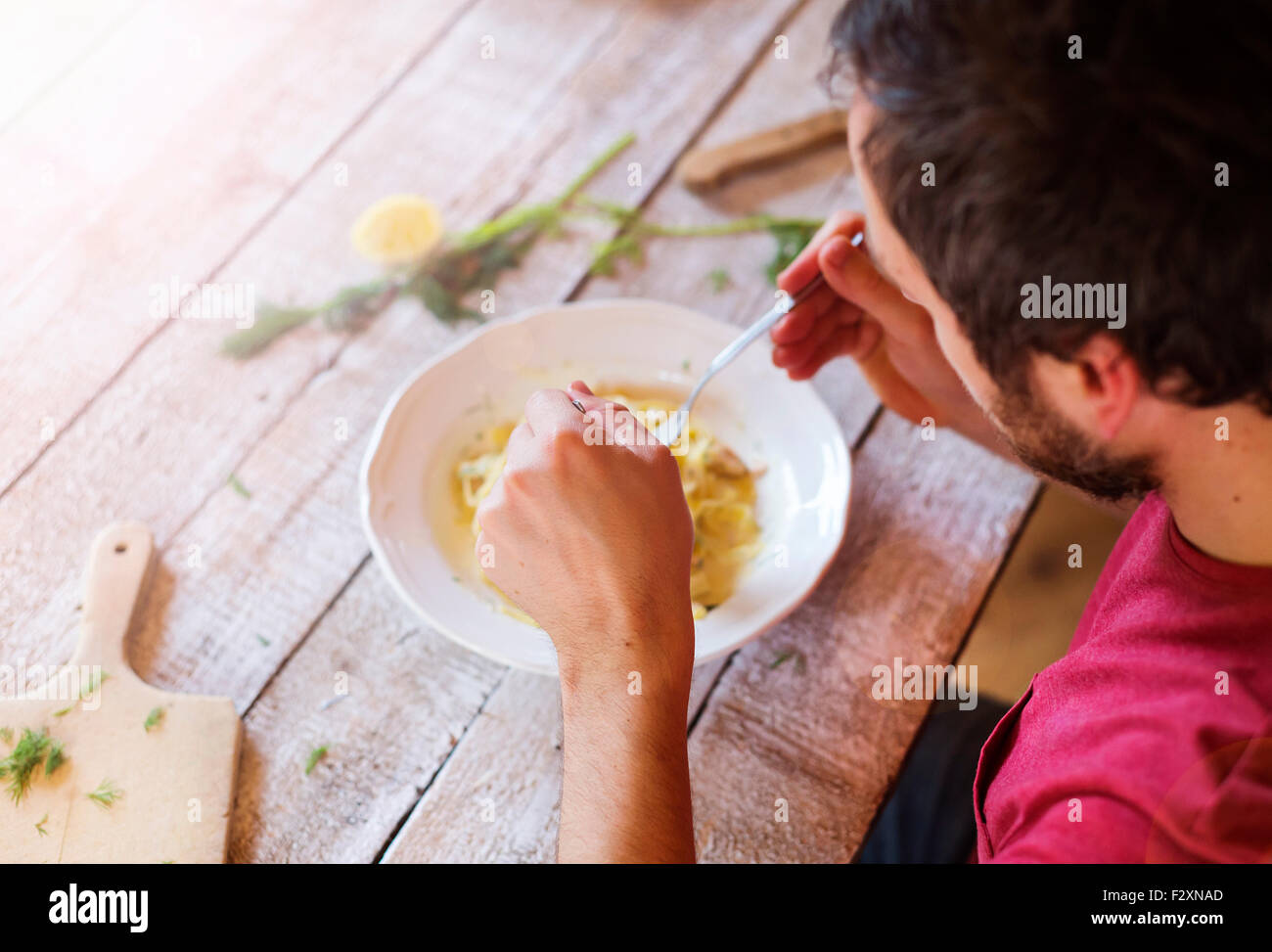 Man eating fish hi-res stock photography and images - Alamy