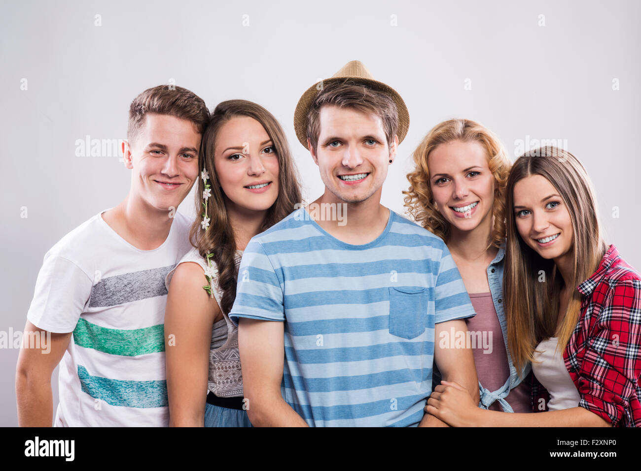 Trendy teenagers posing. Studio shot on white background Stock Photo ...