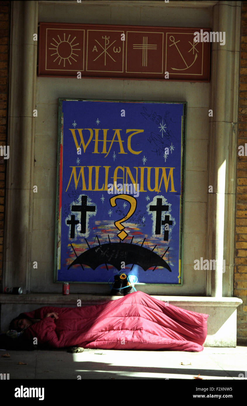 homeless Man sleeping on church front under image upper street ...
