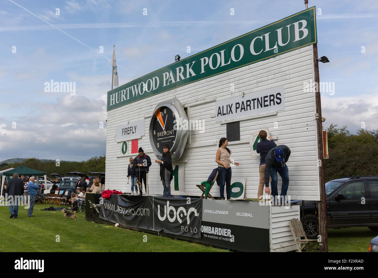 Scoreboard operators at Hurtwood Park polo club Stock Photo - Alamy