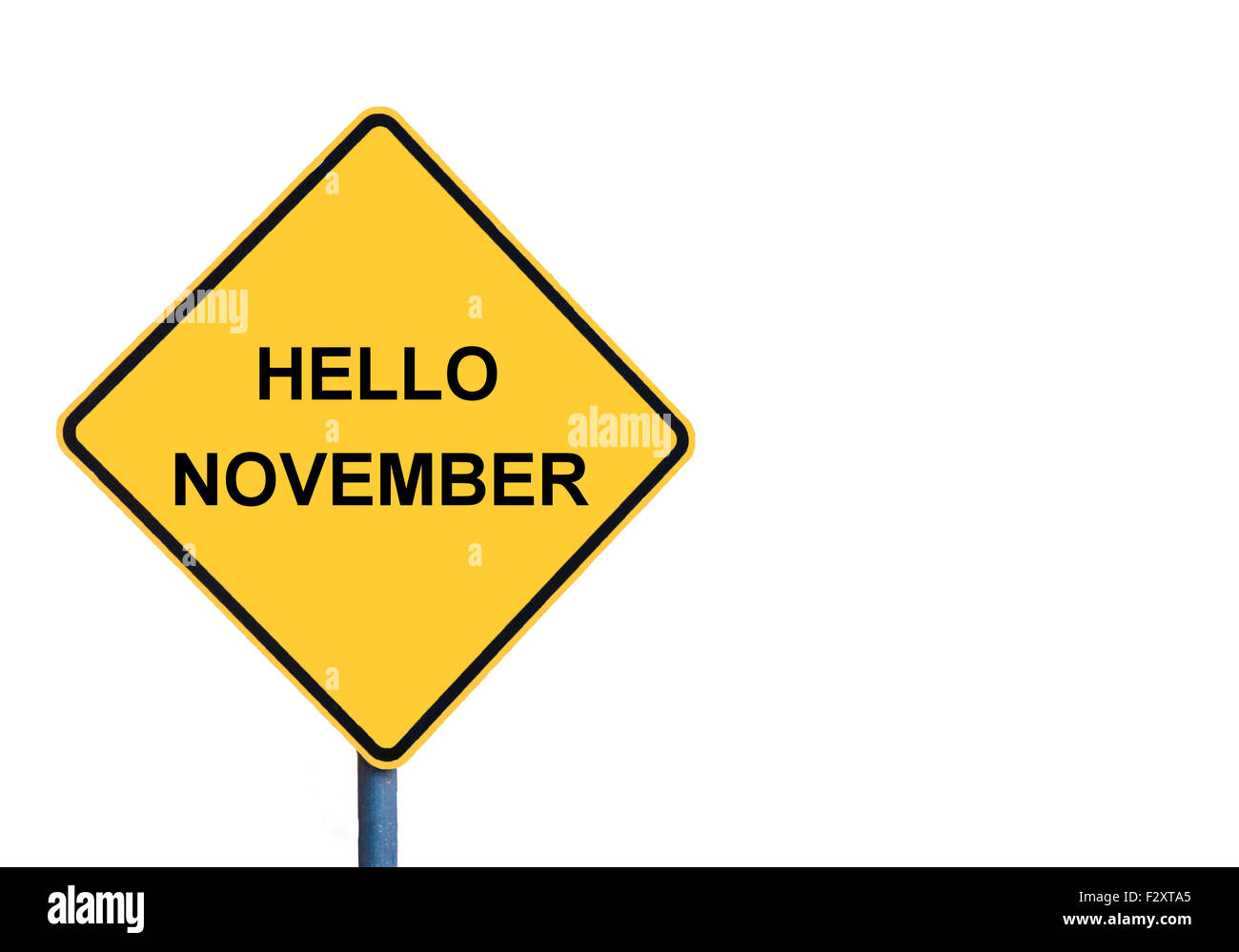 Yellow roadsign with HELLO NOVEMBER message isolated on white ...