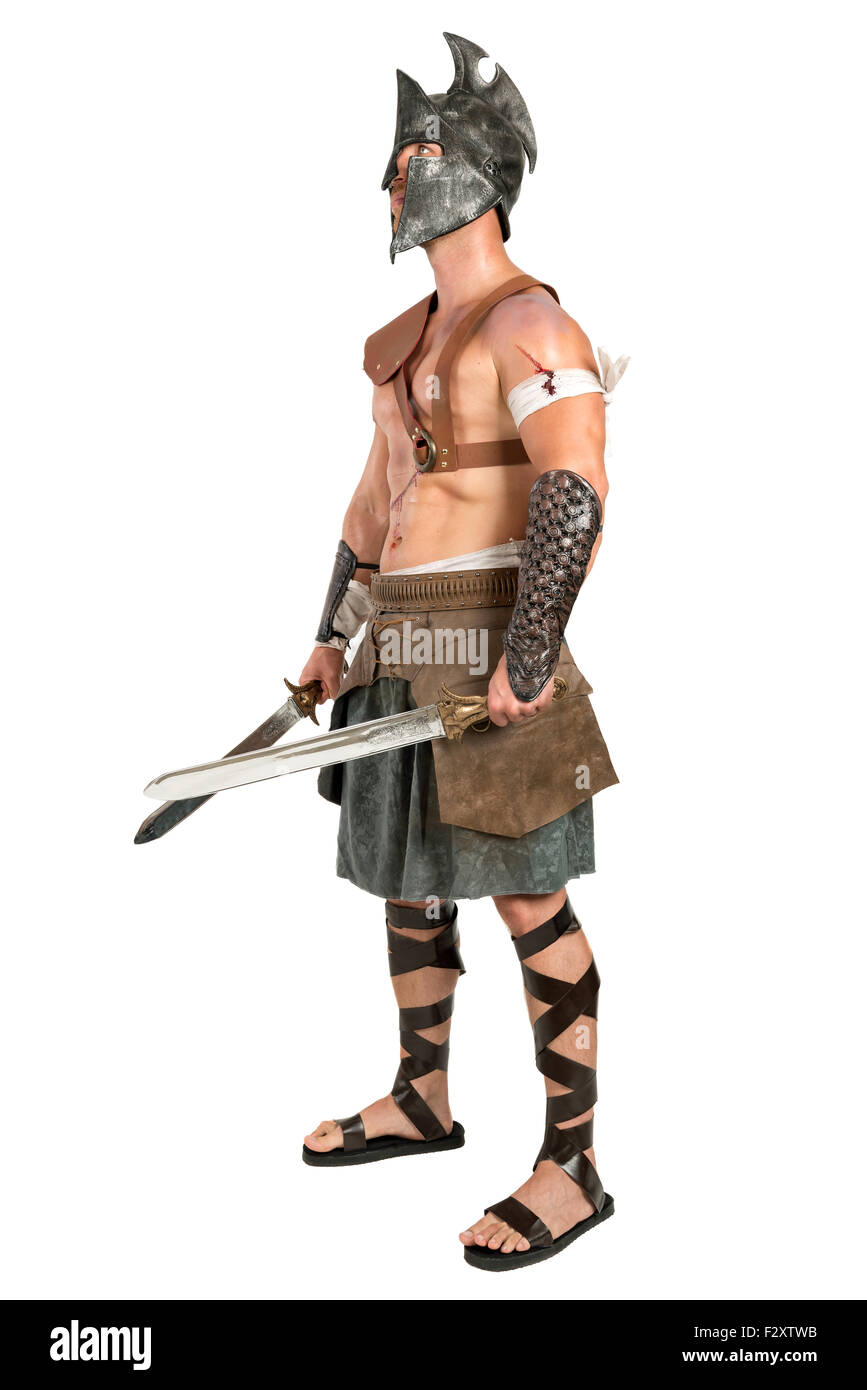 Gladiator posing isolated in a white background Stock Photo - Alamy