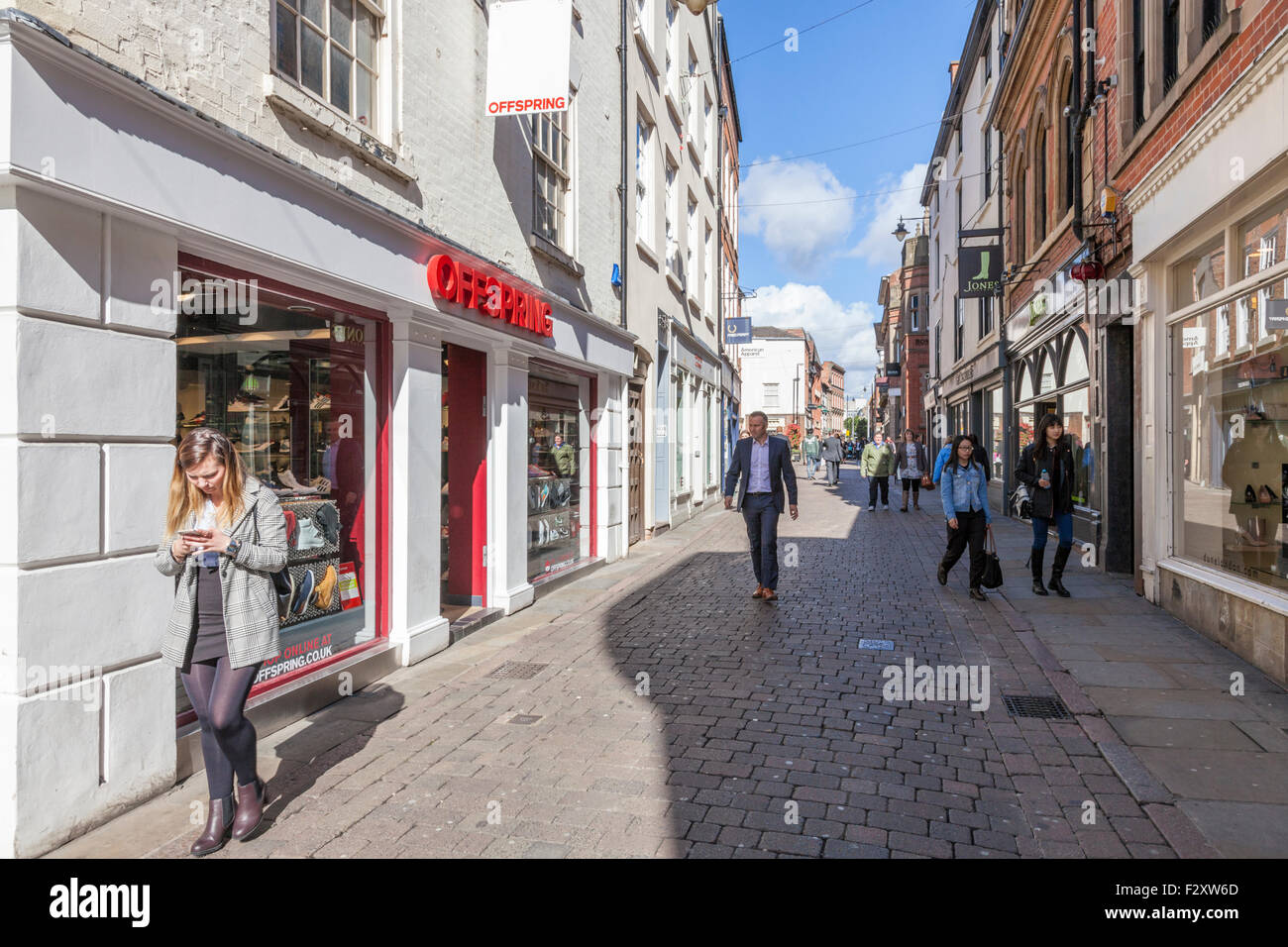 People and shops on a pedestrianised street. Bridlesmith Gate in ...