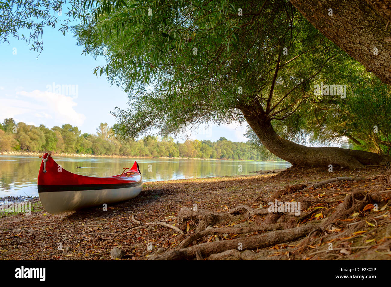Red canoe on beach at river Danube, Hungary Stock Photo - Alamy