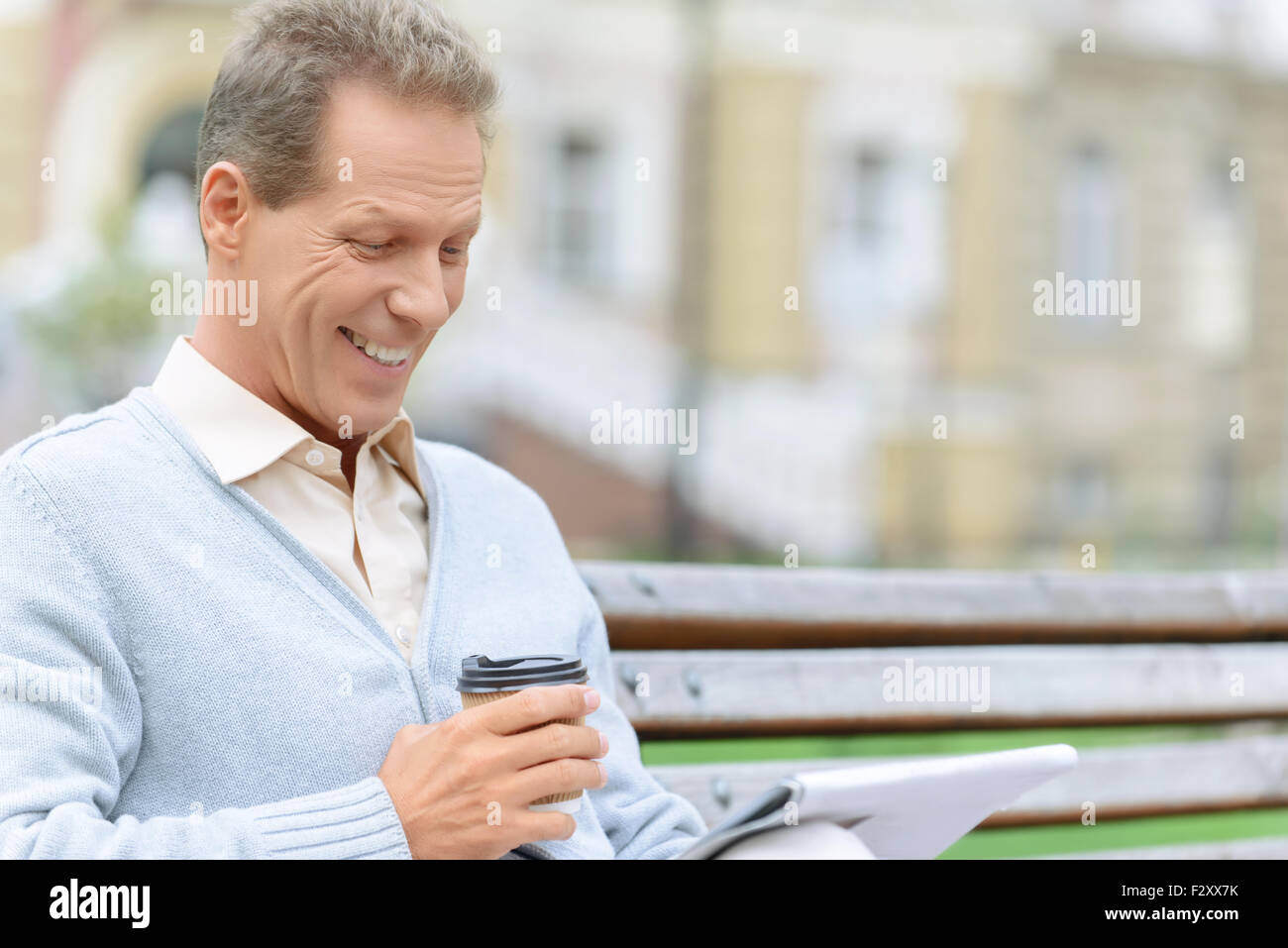 Nice man waiting on the bench Stock Photo - Alamy