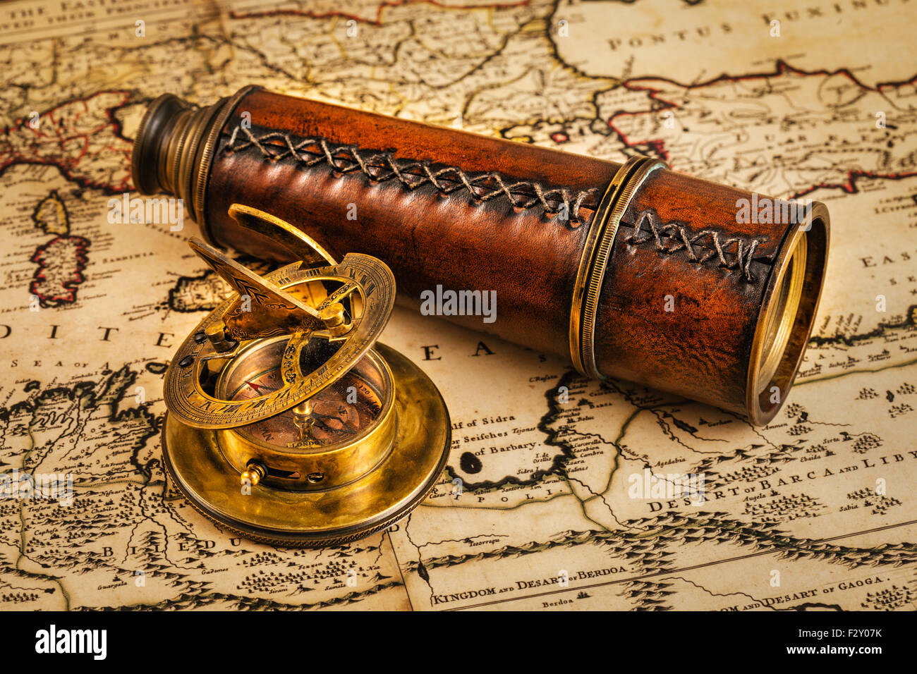 Old vintage compass on ancient map Stock Photo - Alamy