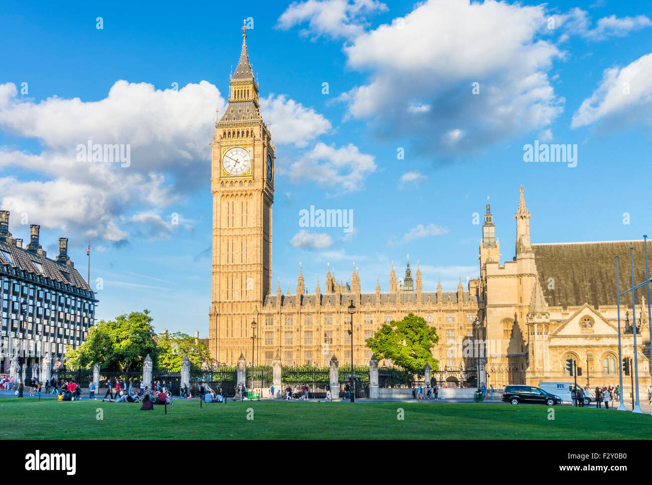 Big Ben clock tower above the Palace of Westminster and houses of ...