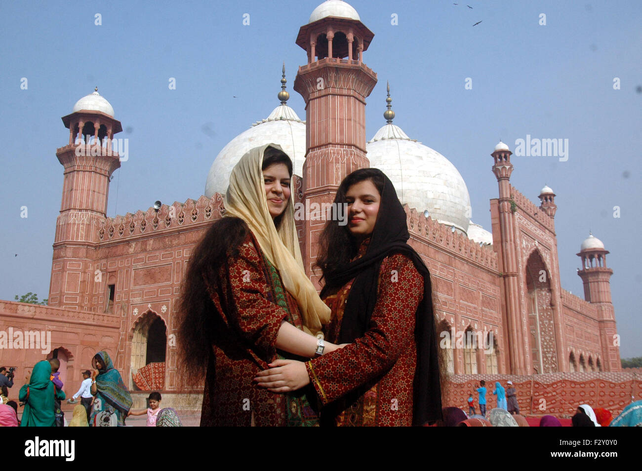 Lahore. 25th Sep, 2015. Pakistani Muslim women greet each other after ...
