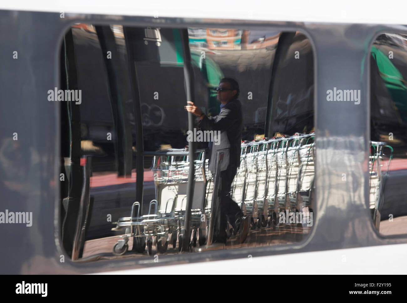 Train station luggage trolleys hi-res stock photography and images - Alamy