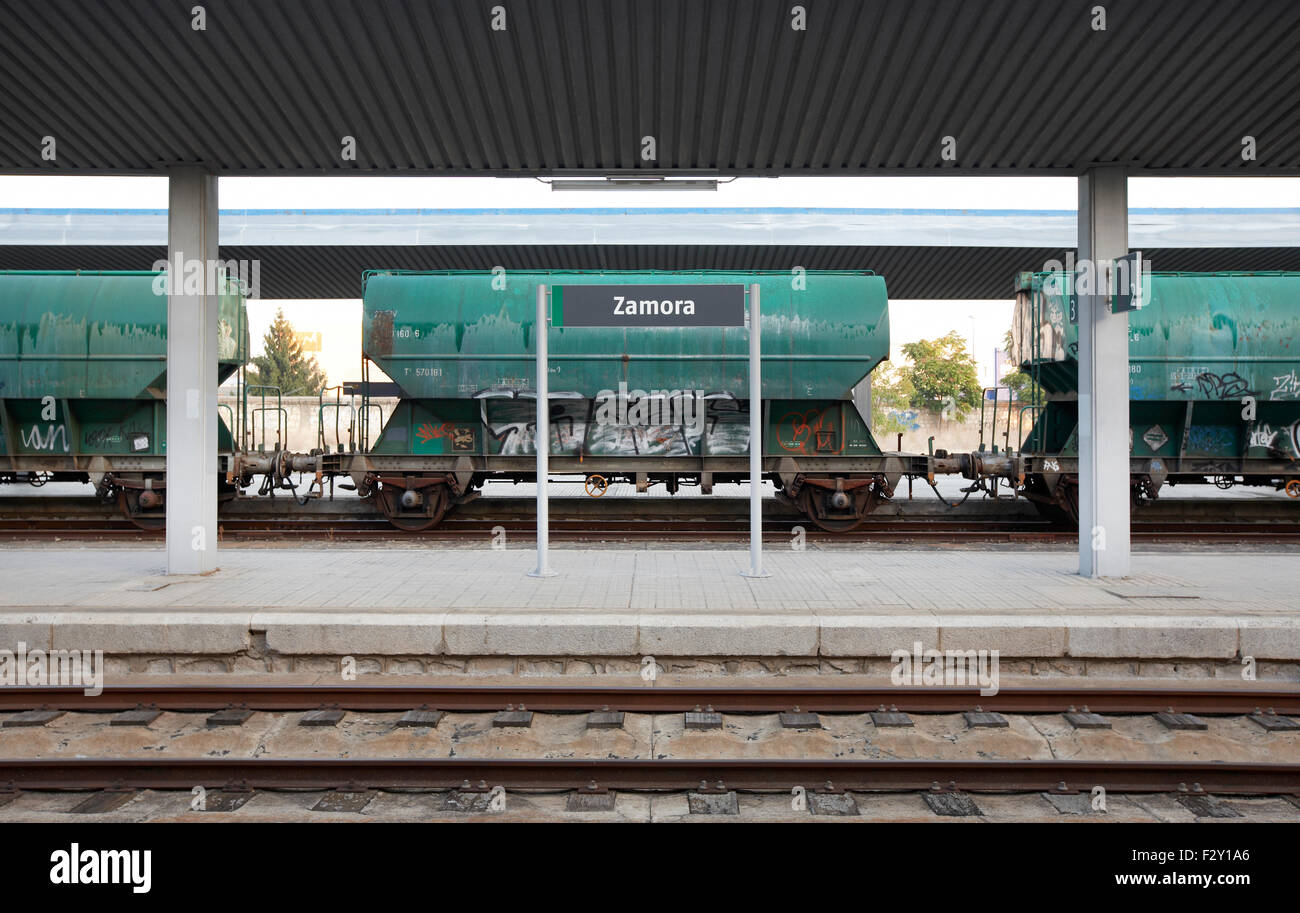Railway station with freight wagons, rails and platforms Stock Photo ...