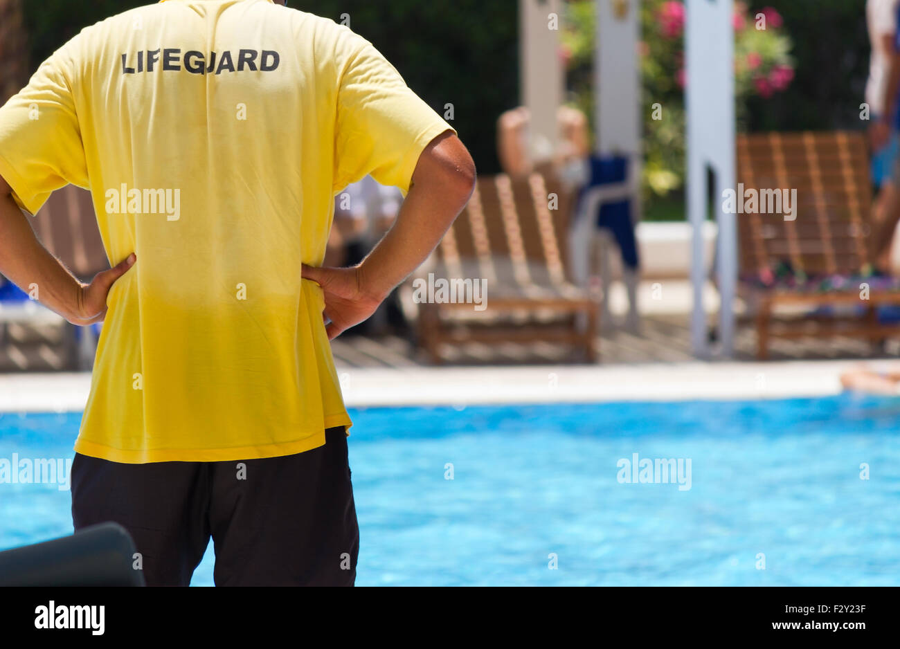 Pool lifeguard hi-res stock photography and images - Alamy
