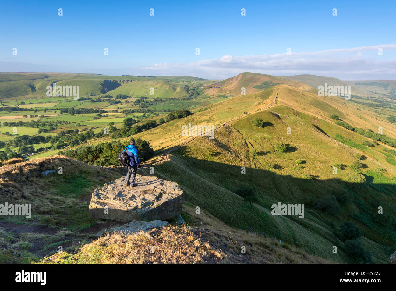 A walker looking at The Great Ridge & Hope Valley Towards Mam Tor, Near ...