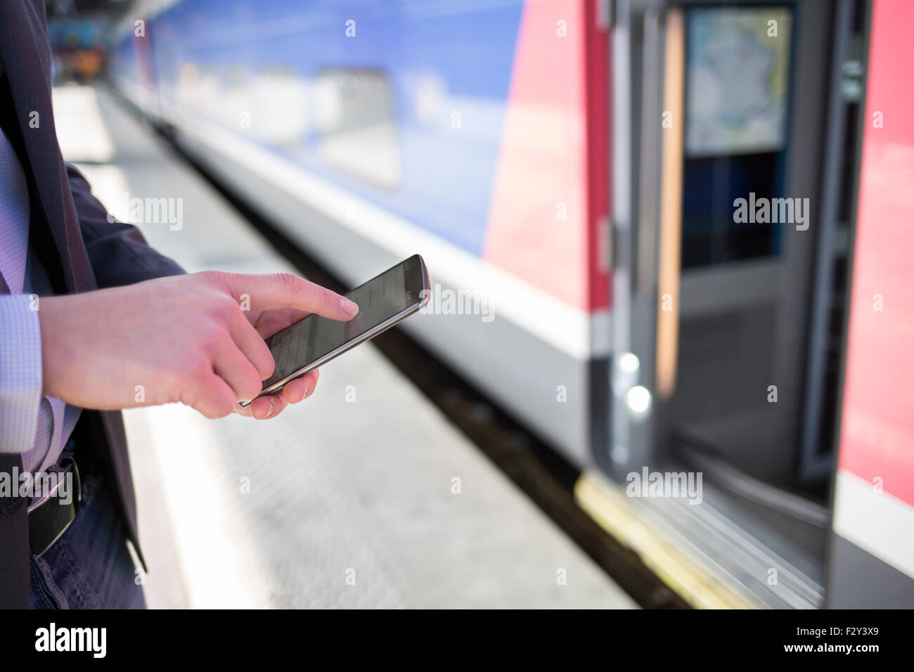 One man on a train platform hi-res stock photography and images - Alamy
