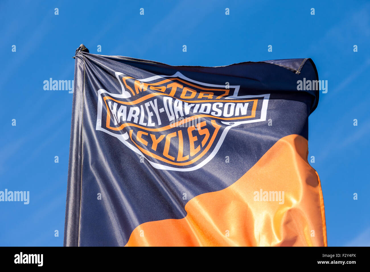 Flag with emblem of a motorcycle Harley Davidson closeup Stock Photo ...