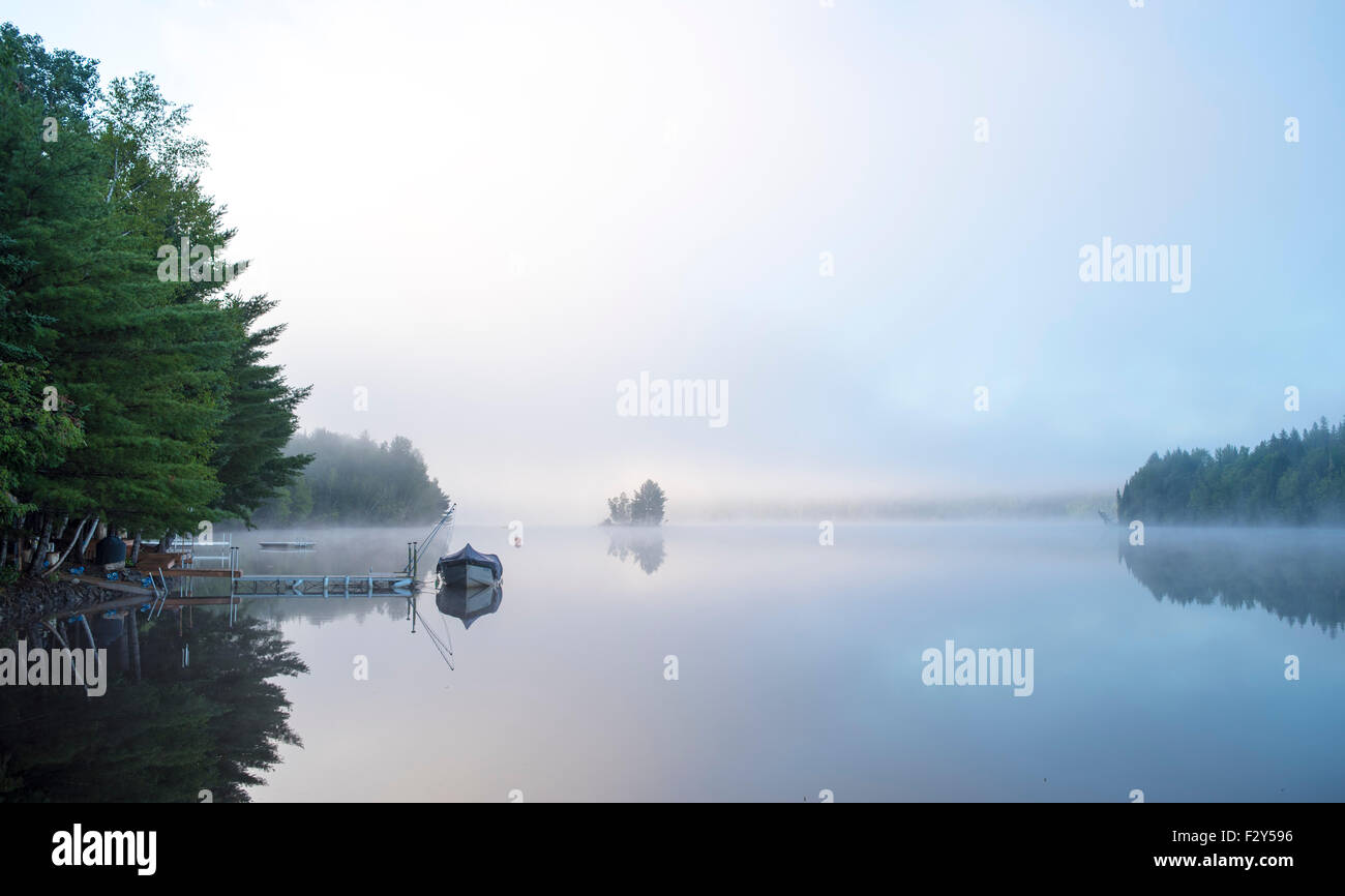 misty morning on a canadian lake Stock Photo - Alamy