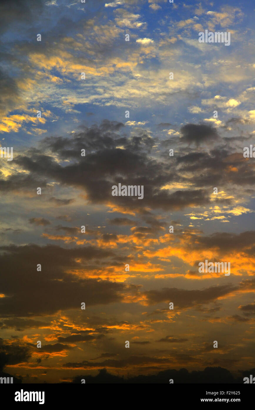 Dramatic Sunlight with Vivid Clouds in Sky Stock Photo - Alamy