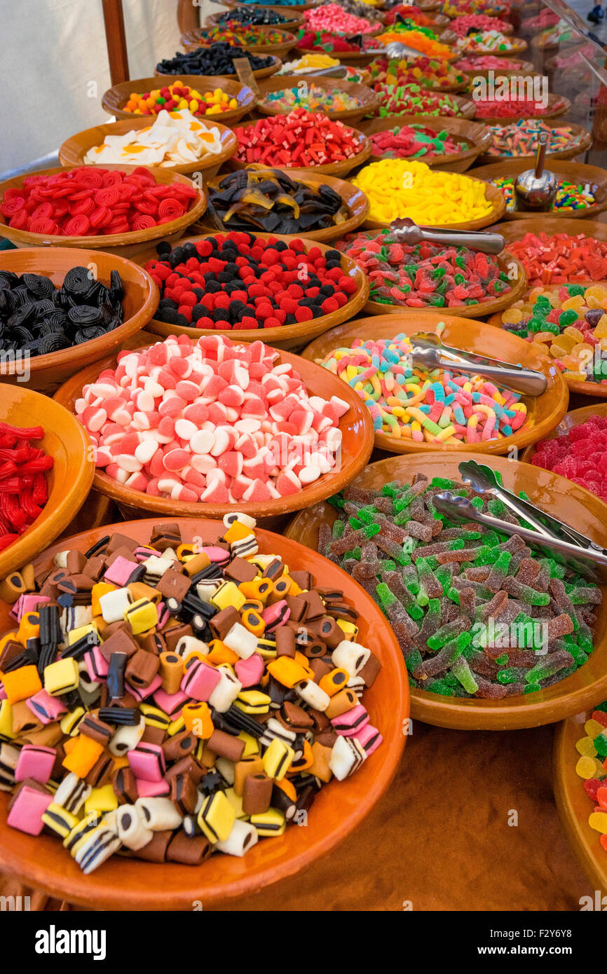 very bright sweets on the market Stock Photo - Alamy