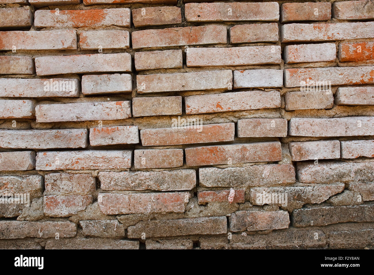 Old brick wall in a background Stock Photo - Alamy