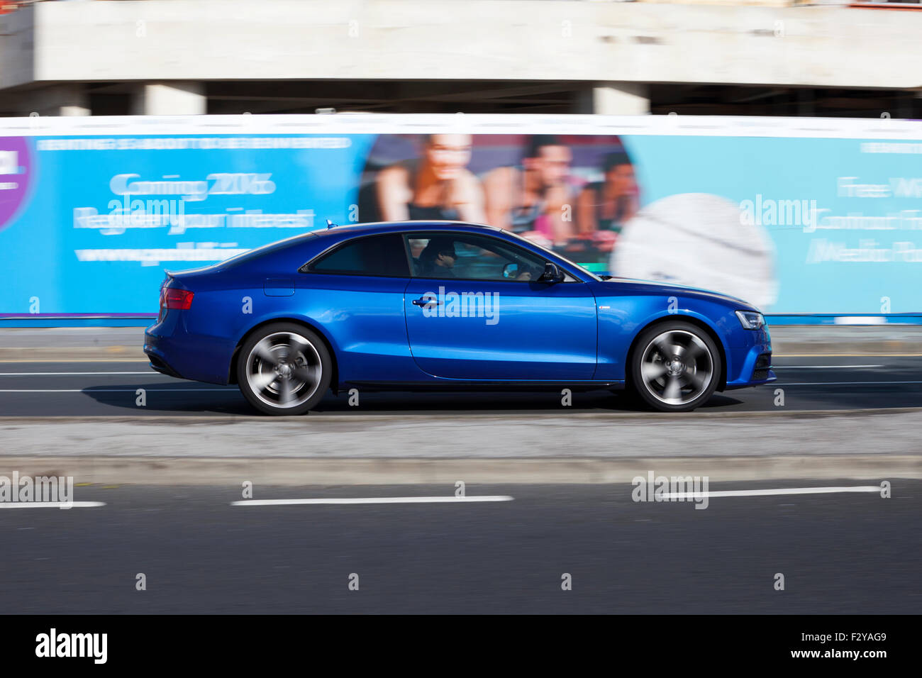 Side view road blur Audi A5; Blurred moving vehicles on 'The Strand' at ...