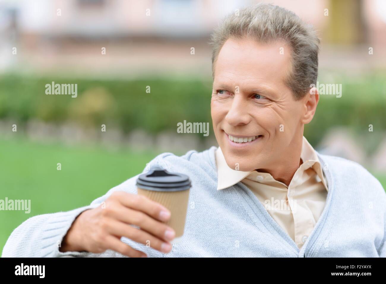 Nice man waiting on the bench Stock Photo - Alamy