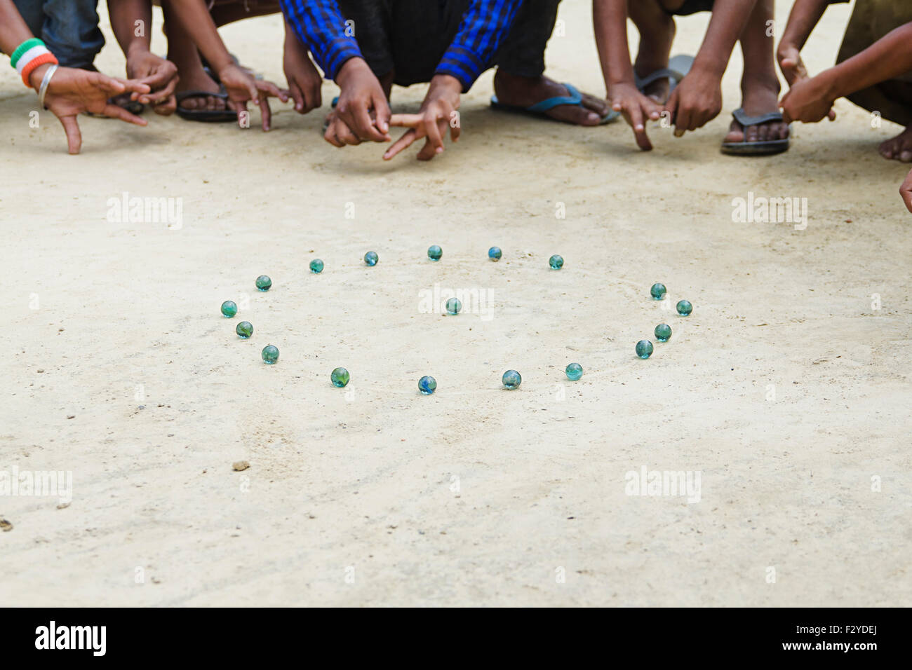 Group Crowds Rural kdis Boys Playing Marble Stock Photo - Alamy