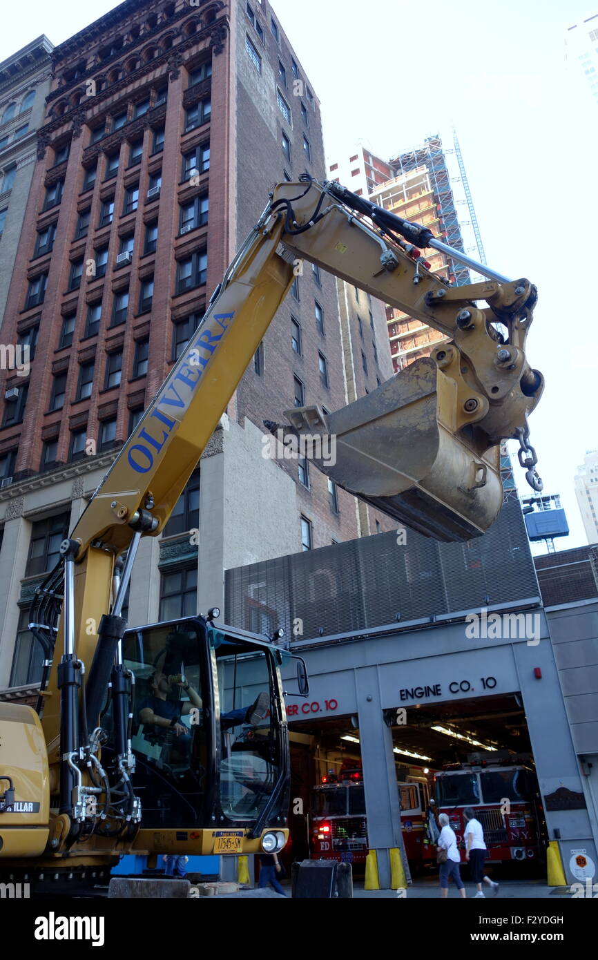 Construction crane and tractor working in front of Engine Company 10 ...