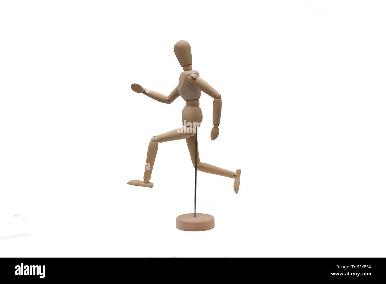drawing doll isolated running. wooden doll runs on white background ...