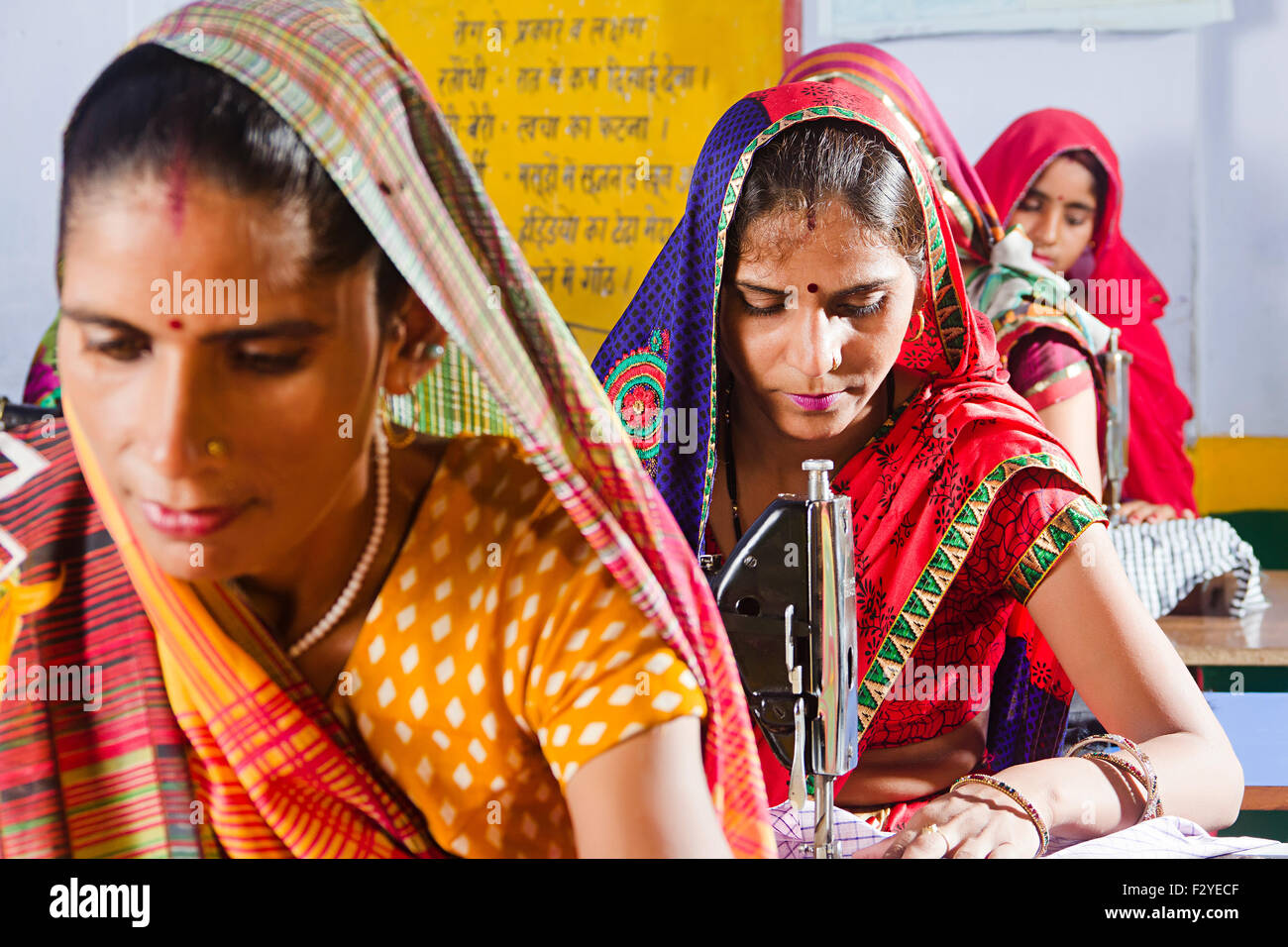 Female tailor sits table hi-res stock photography and images - Alamy