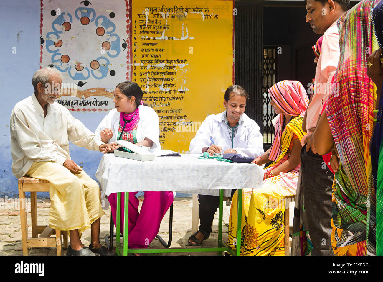indian rural Villager group crowds Medical Dispensary Checking Stock ...