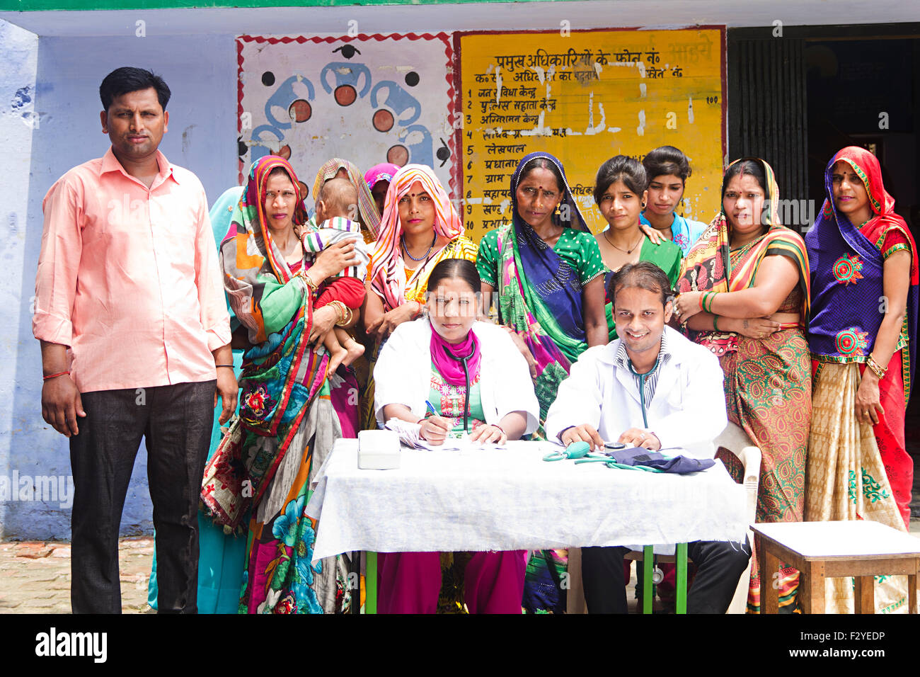 indian rural Villager group crowds Medical Dispensary Checking Stock ...