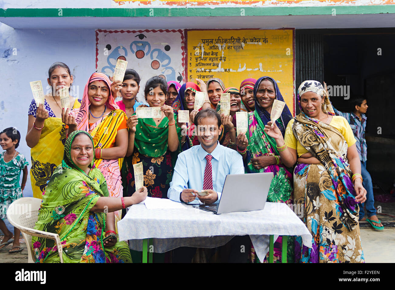 indian rural Villager group crowds Supervisor Giving money Workers ...