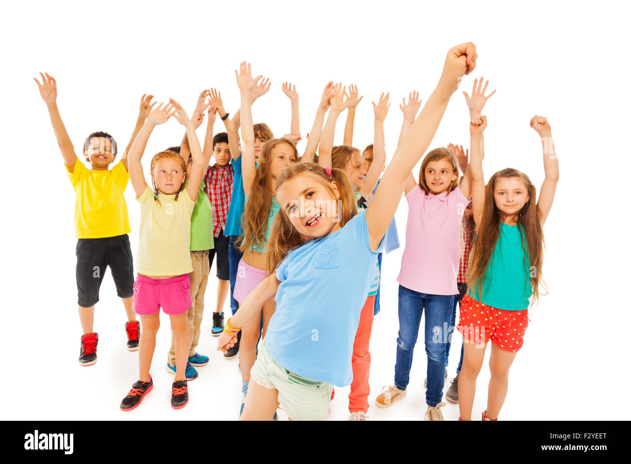 Little girl and group of kids in the back Stock Photo - Alamy