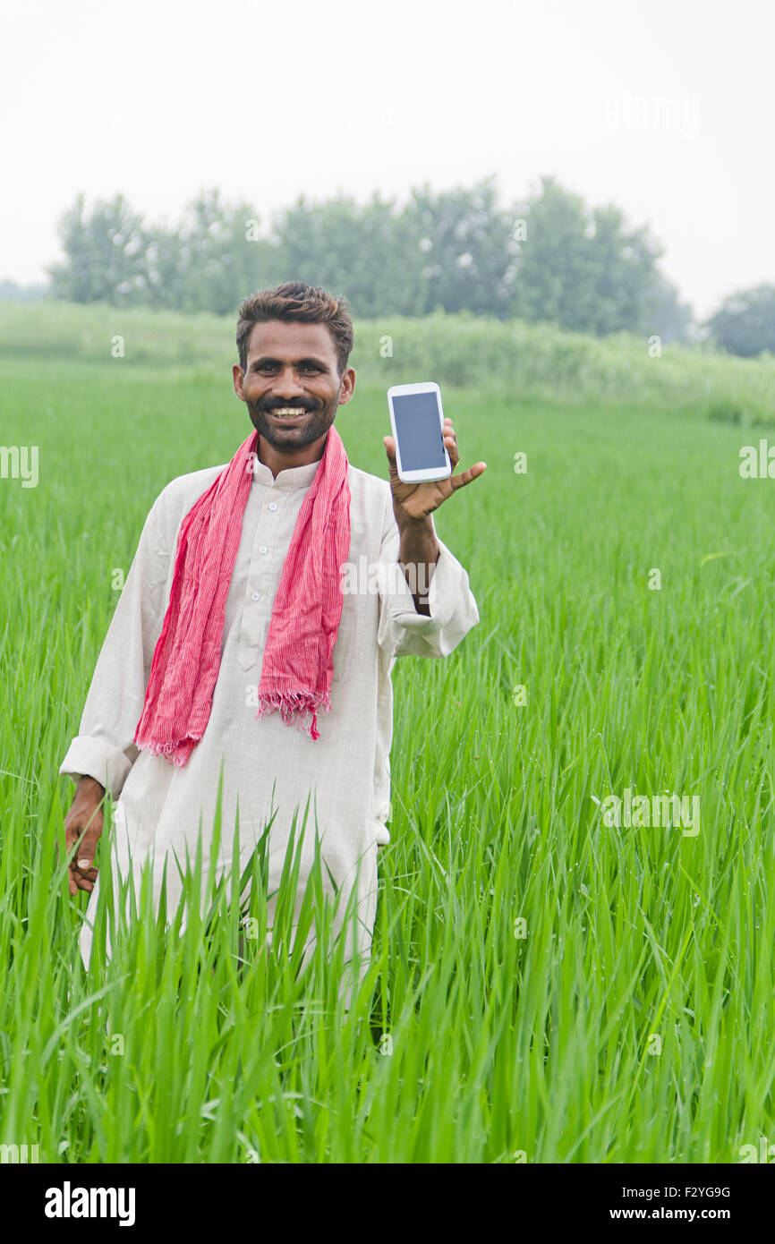 1 indian rural farmer Farm Mobile Phone Quality showing Stock Photo - Alamy