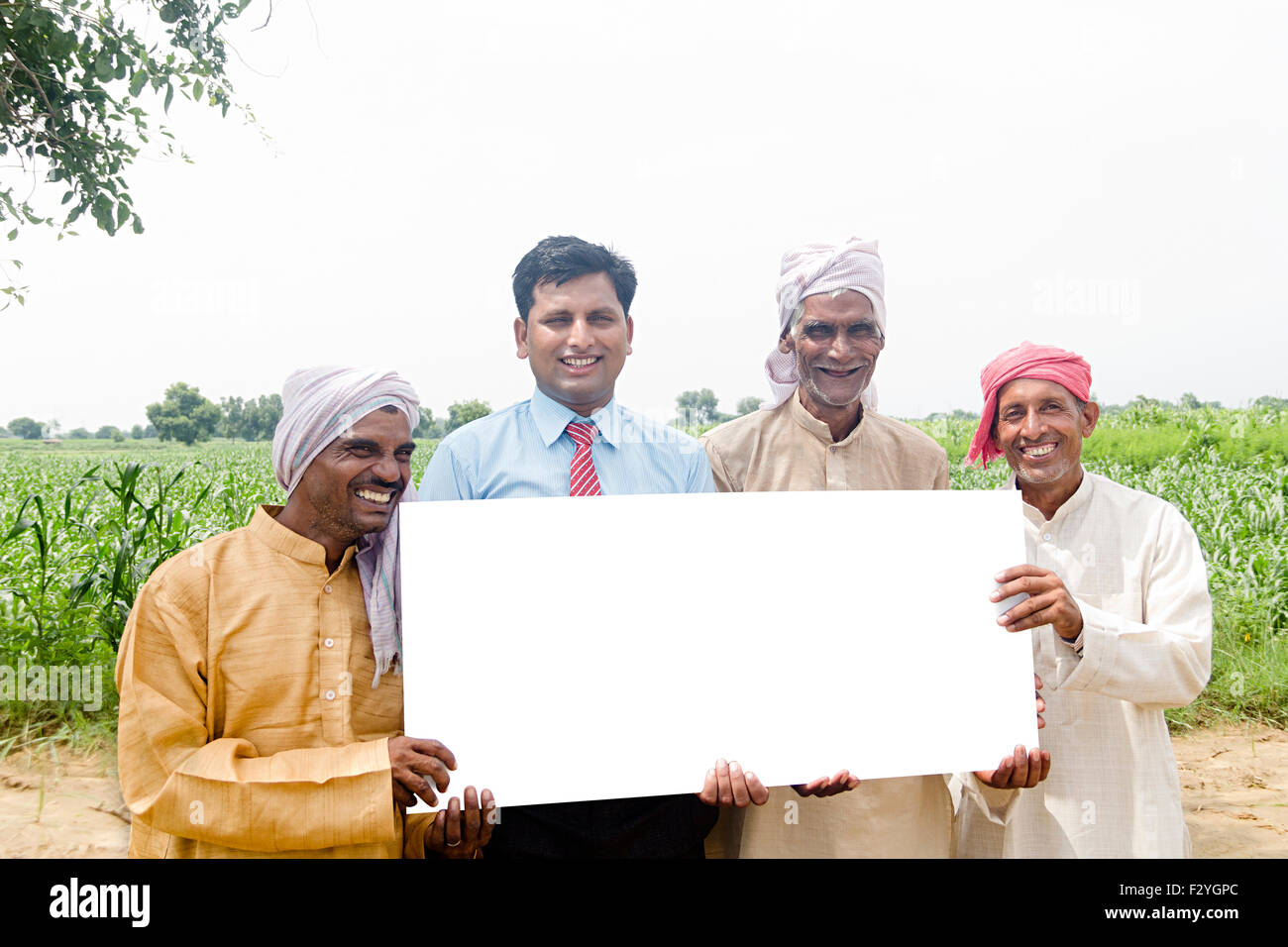 4 indian rural Business Man and farmer farm Message Board showing Stock ...
