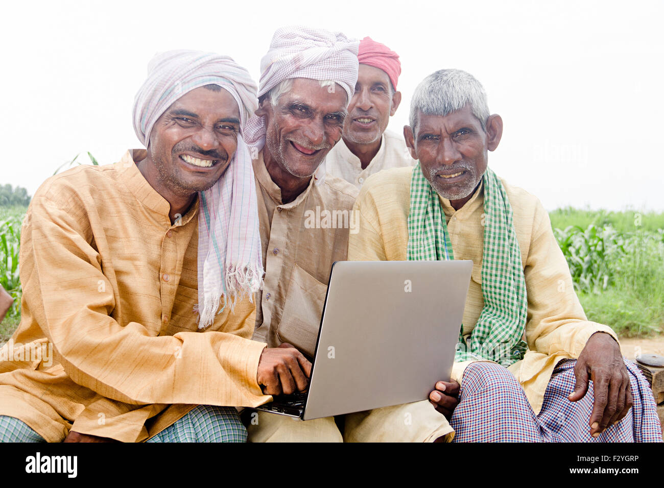 4 indian rural farmer farm laptop Working Stock Photo - Alamy