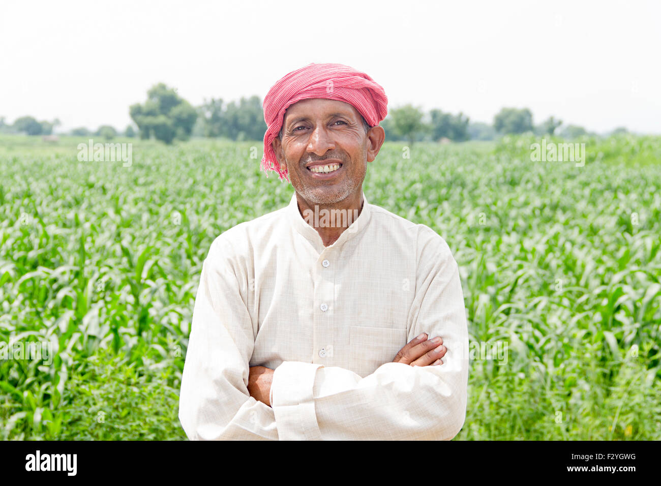 1 indian rural Senior farmer farm standing pose Stock Photo - Alamy