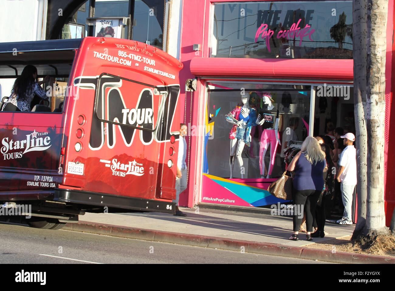 Christina Milian jumps on board a passing TMZ Tour Guide bus and asks ...