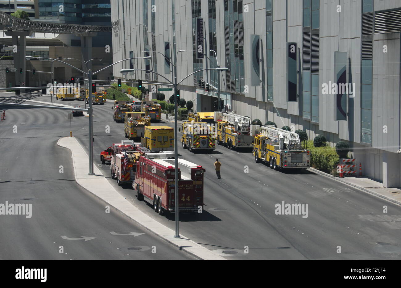 Emergency services attend to a fire that broke out on the 14th floor of ...