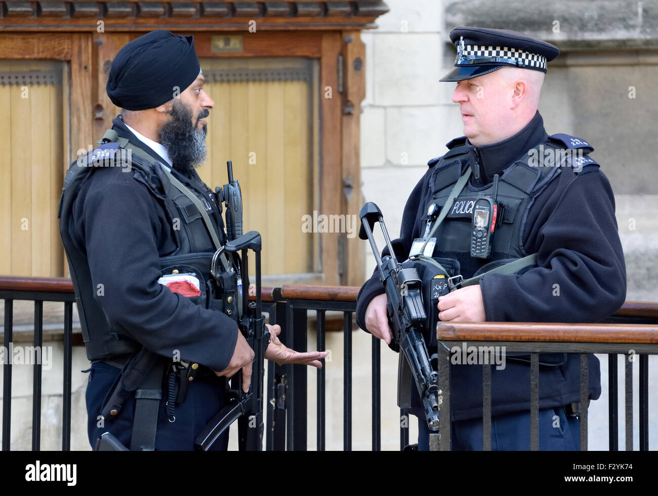 London, England, UK. Armed Sikh police officer outside the Houses of ...
