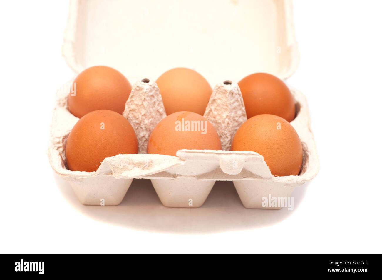 carton box with six eggs isolated on the white background Stock Photo ...