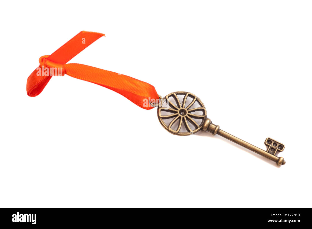 Key To Success With Red Bow isolated on white Stock Photo - Alamy