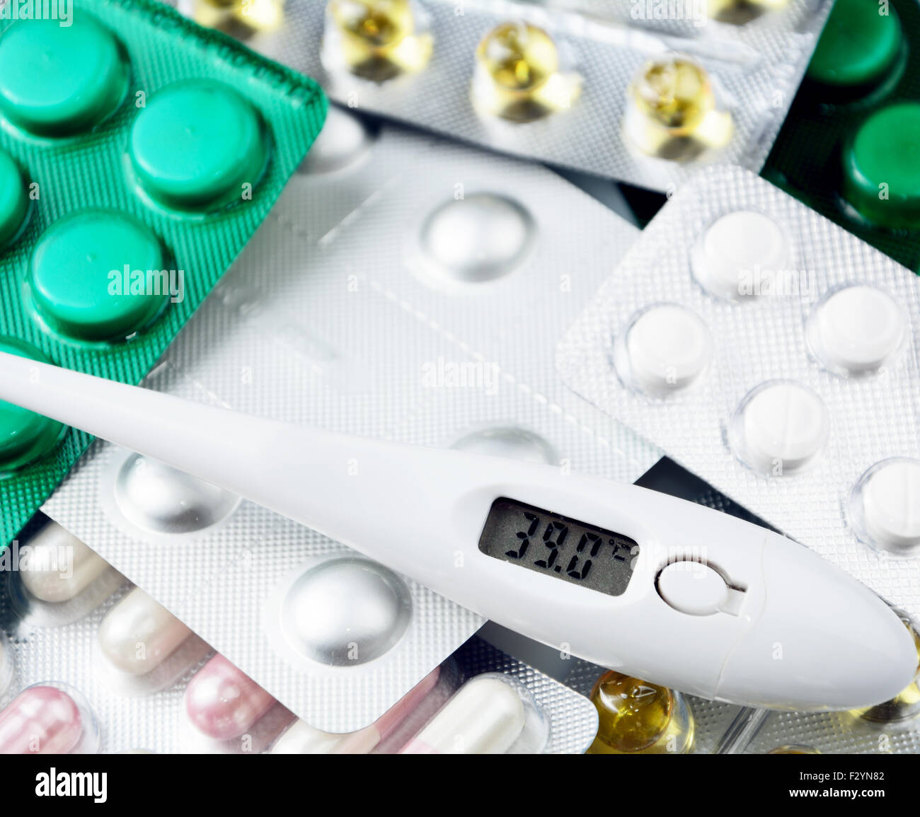 Medications on the table for treating patients on the white background ...