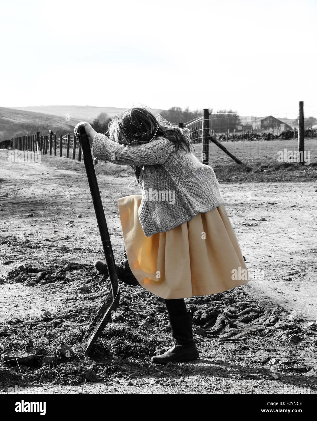 Photograph taken of a girl digging on a Yorkshire Farm and edited with ...